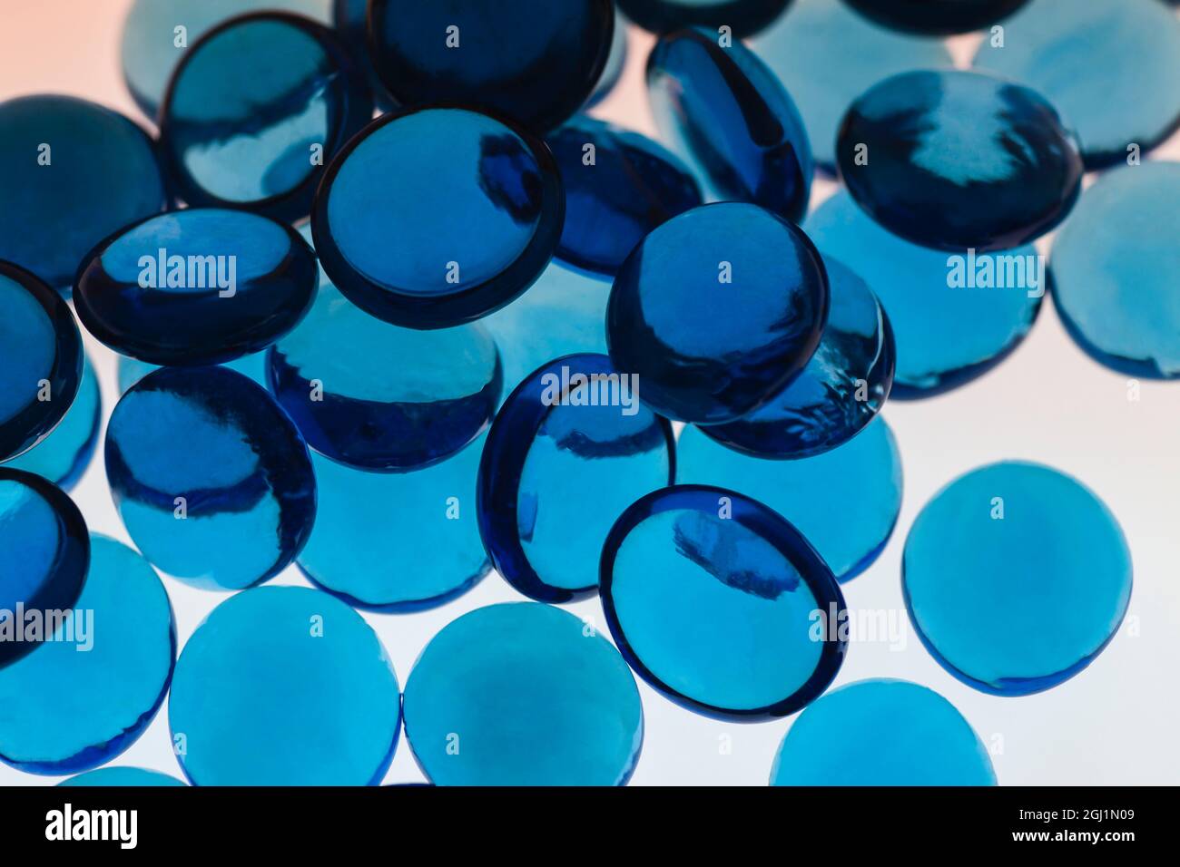 Glass Pebbles with light Stock Photo - Alamy