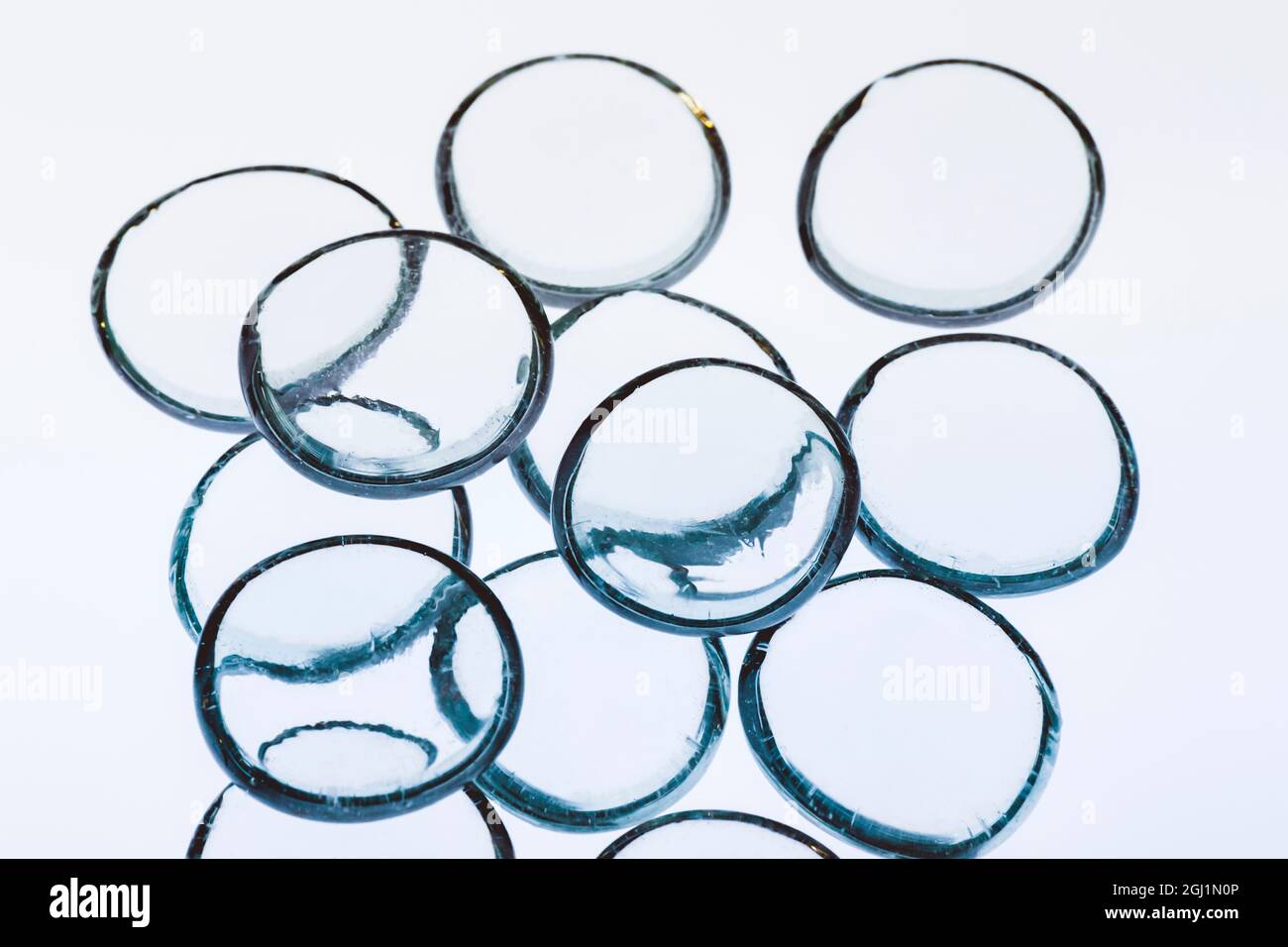 Clear Glass Pebbles with light Stock Photo - Alamy