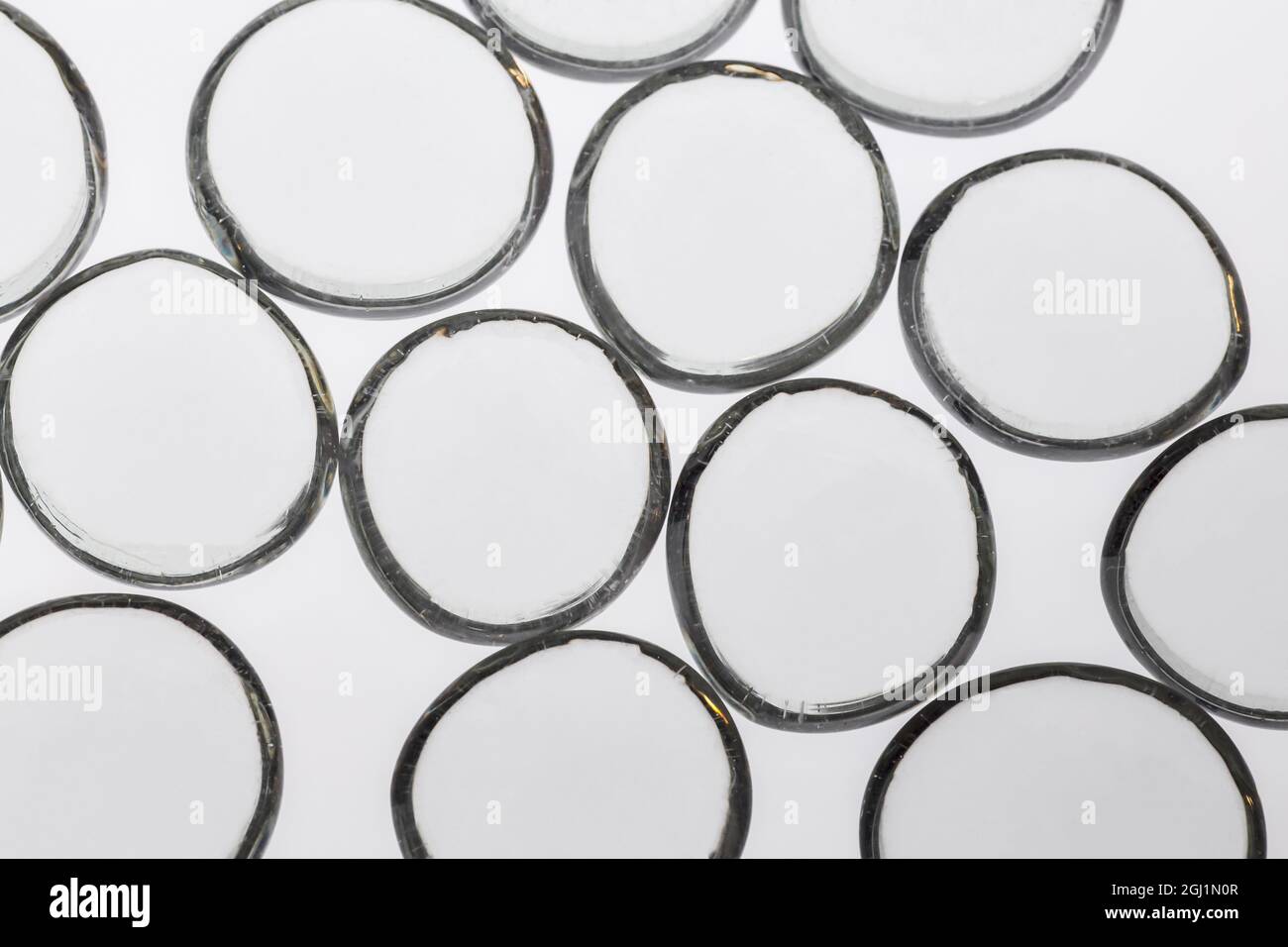 Clear Glass Pebbles with light Stock Photo - Alamy