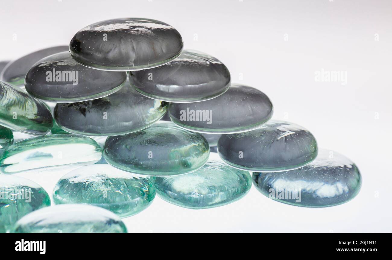 Clear Glass Pebbles with light Stock Photo - Alamy
