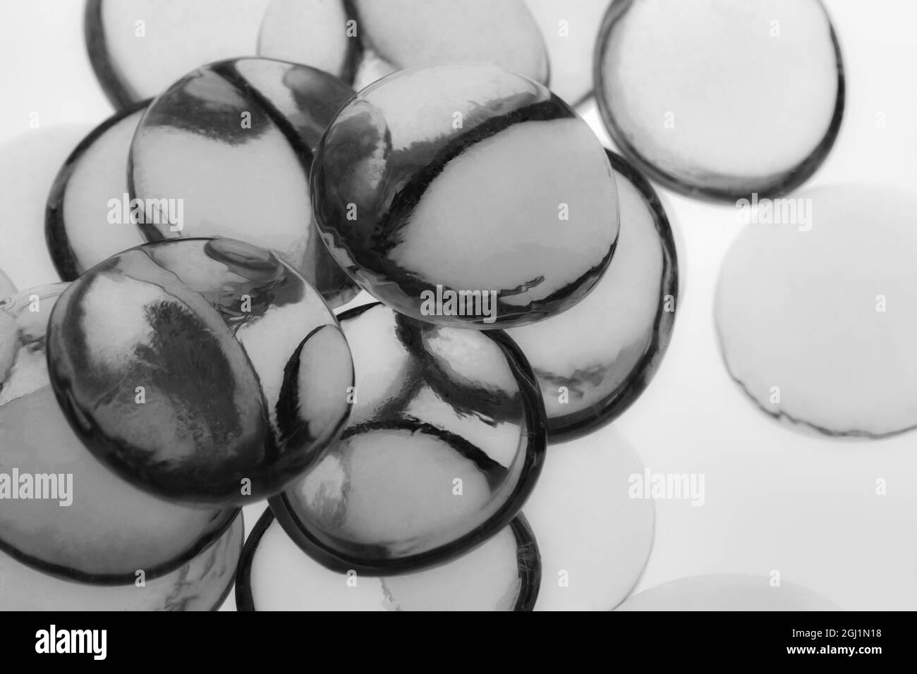 Clear Glass Pebbles with light Stock Photo - Alamy