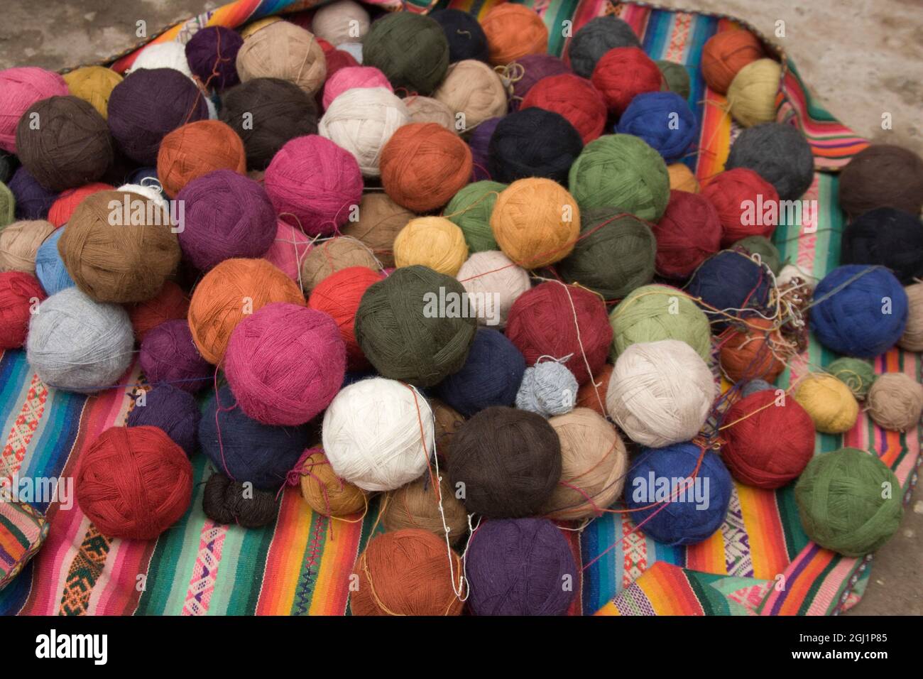 Pile of balls of yarn for weaving, Chinchero, Department of Cuzco, Peru ...