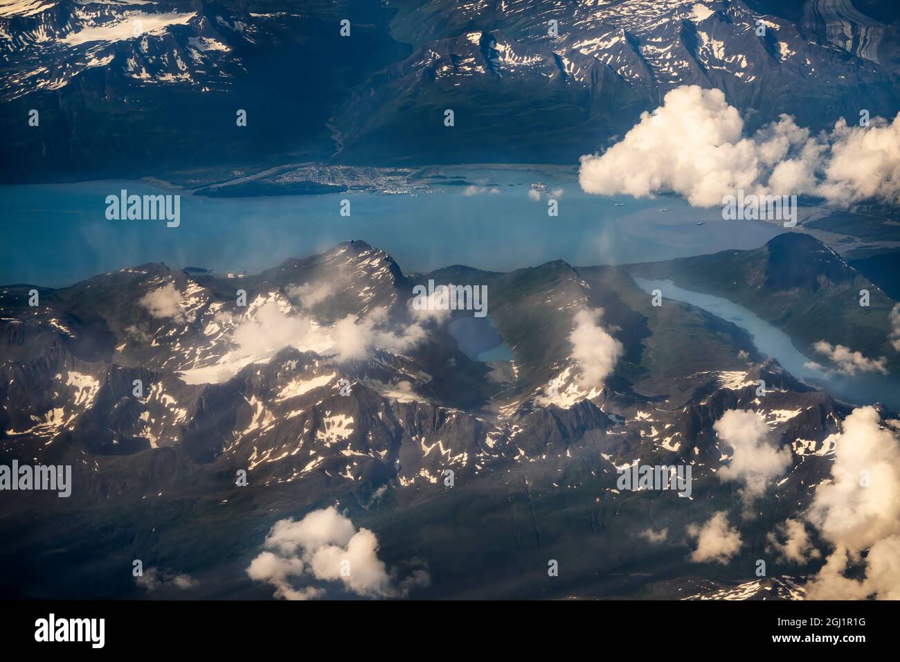 USA, Alaska, Chugach Mountain Range. Aerial view of town of Valdez and ...