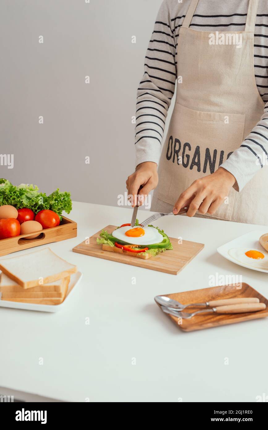 Man eating sandwiches home hi-res stock photography and images - Alamy