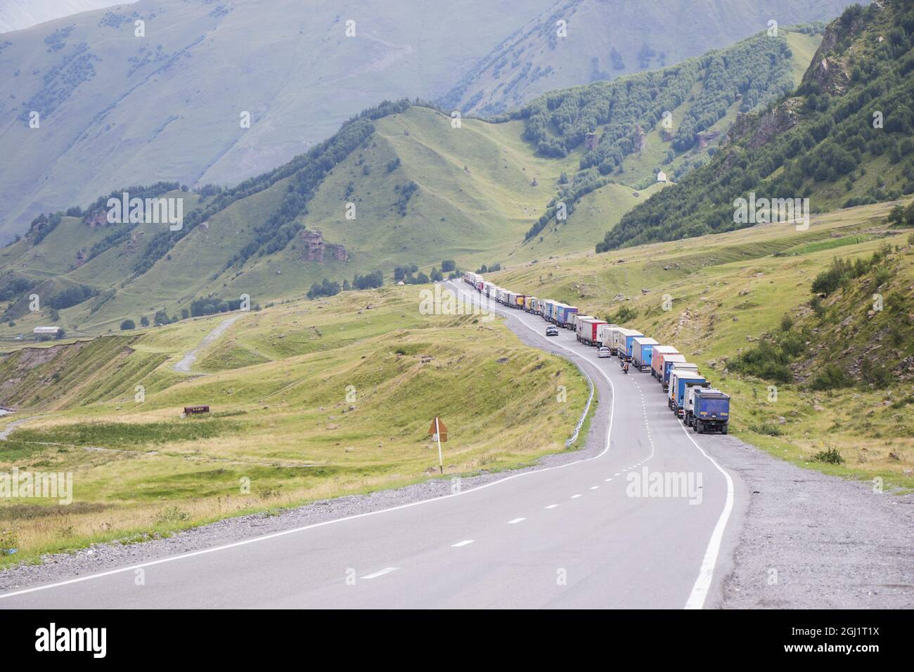 Large group of the trailers on the highway Stock Photo - Alamy
