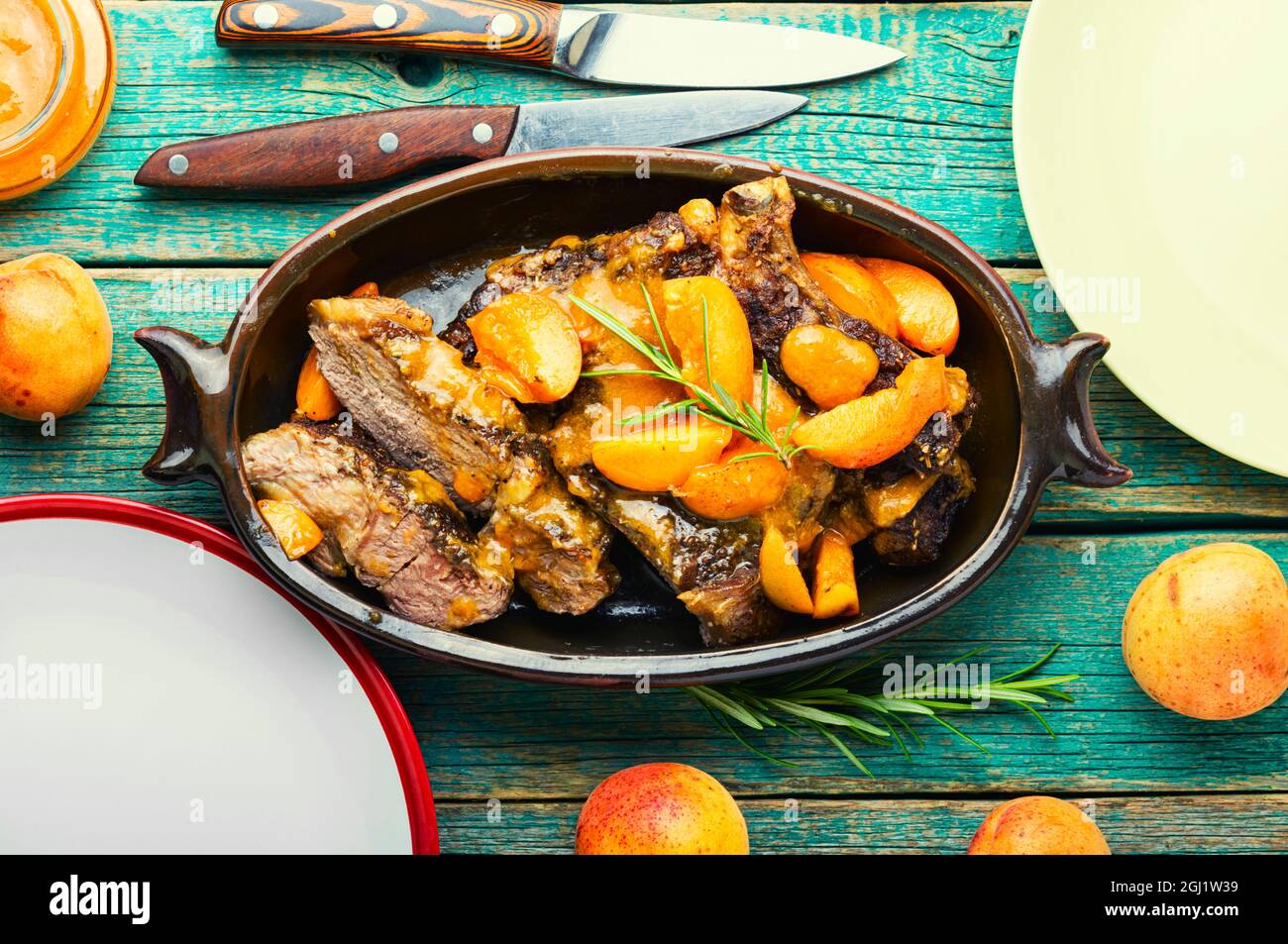 Appetizing beef entrecote in apricot sauce.Grilled sliced beef steak ...