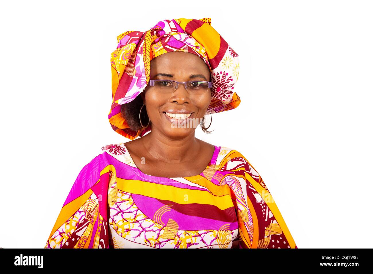 beautiful african woman woman standing in traditional clothes looking ...