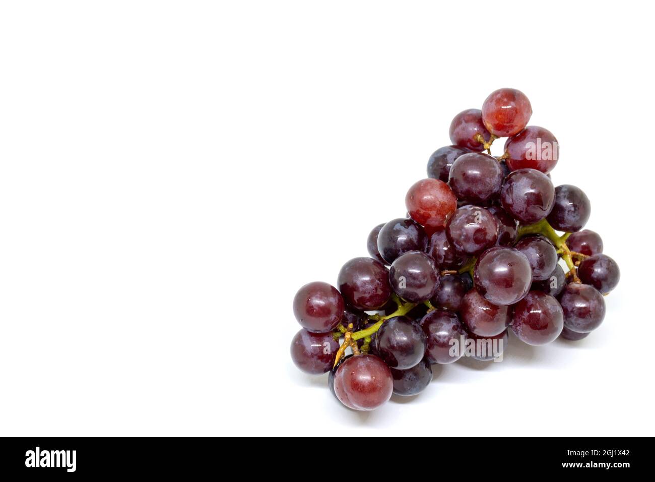 Seedless grapes isolated on white background Stock Photo - Alamy