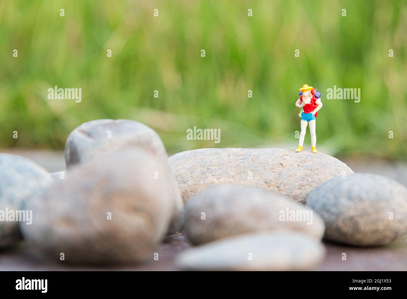 Travel and Adventure concepts. Traveler miniature mini figure with ...