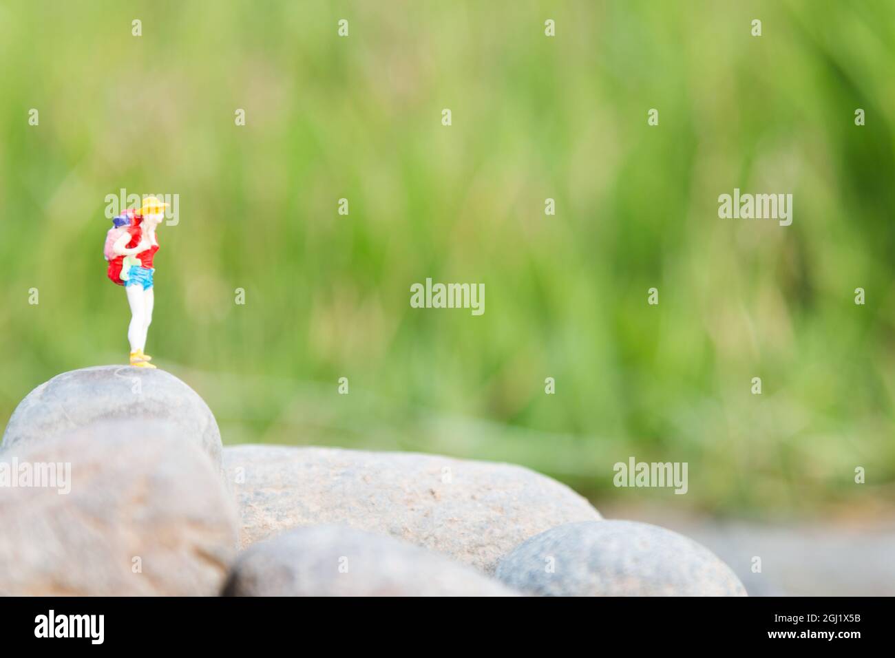 Travel and Adventure concepts. Traveler miniature mini figure with ...