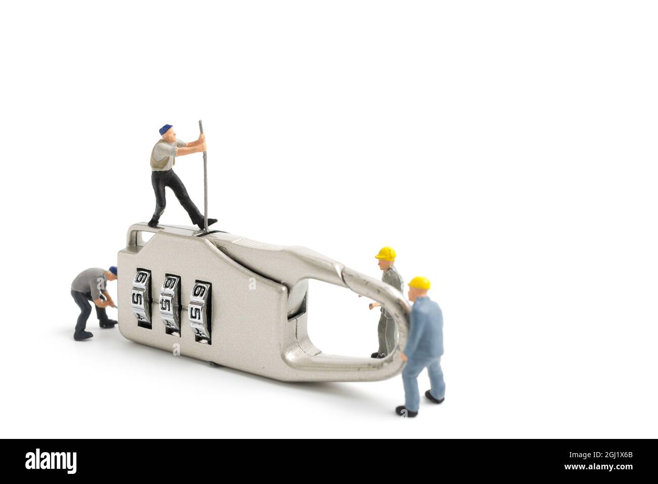 Miniature people worker : Teamwork helps to unlock password on the keys ...