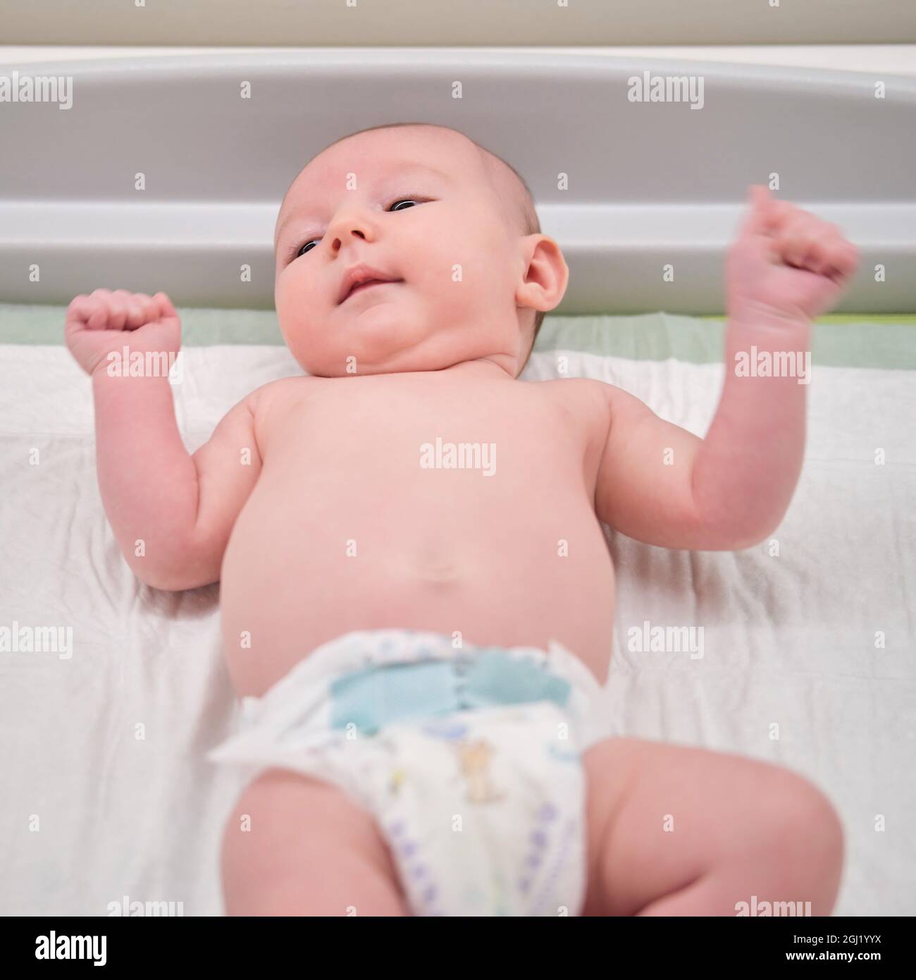 Doctor baby diaper change hi-res stock photography and images - Alamy
