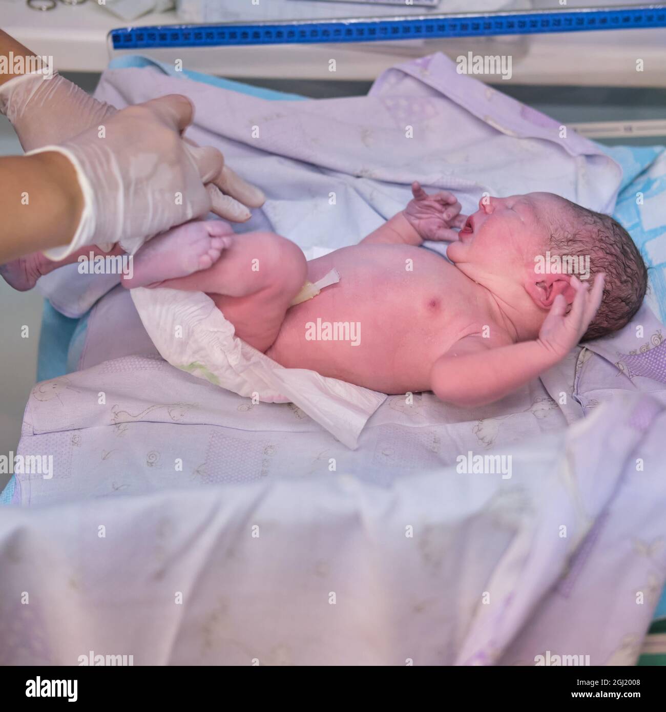 Hospital nursery newborn crying hi-res stock photography and images - Alamy