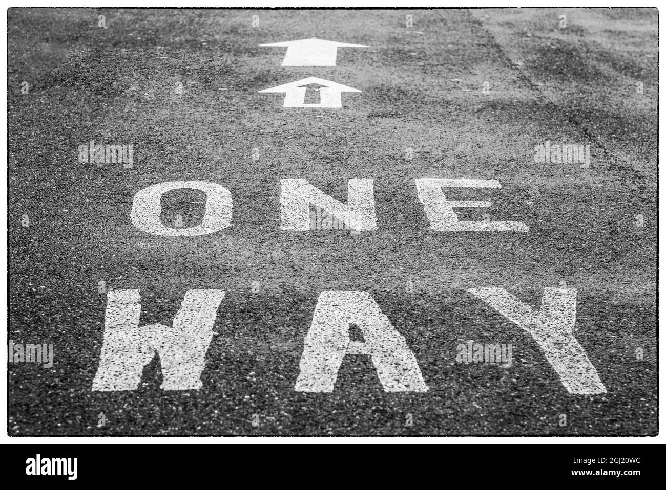 One way road sign Black and White Stock Photos & Images - Alamy