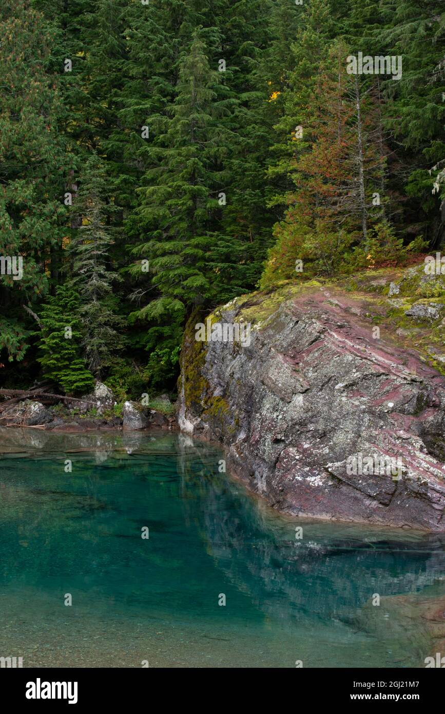 USA, Montana. Rocky outcrop, McDonald Creek, Glacier National Park ...