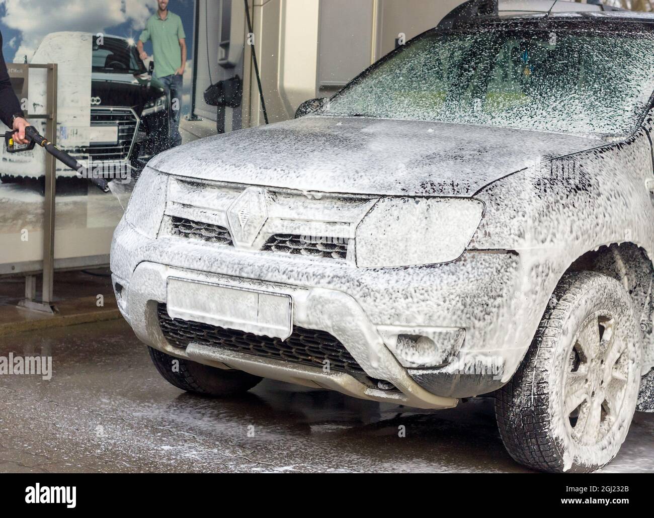Kaliningrad, Russia, March 1, 2020. A man washes his car at a touchless ...