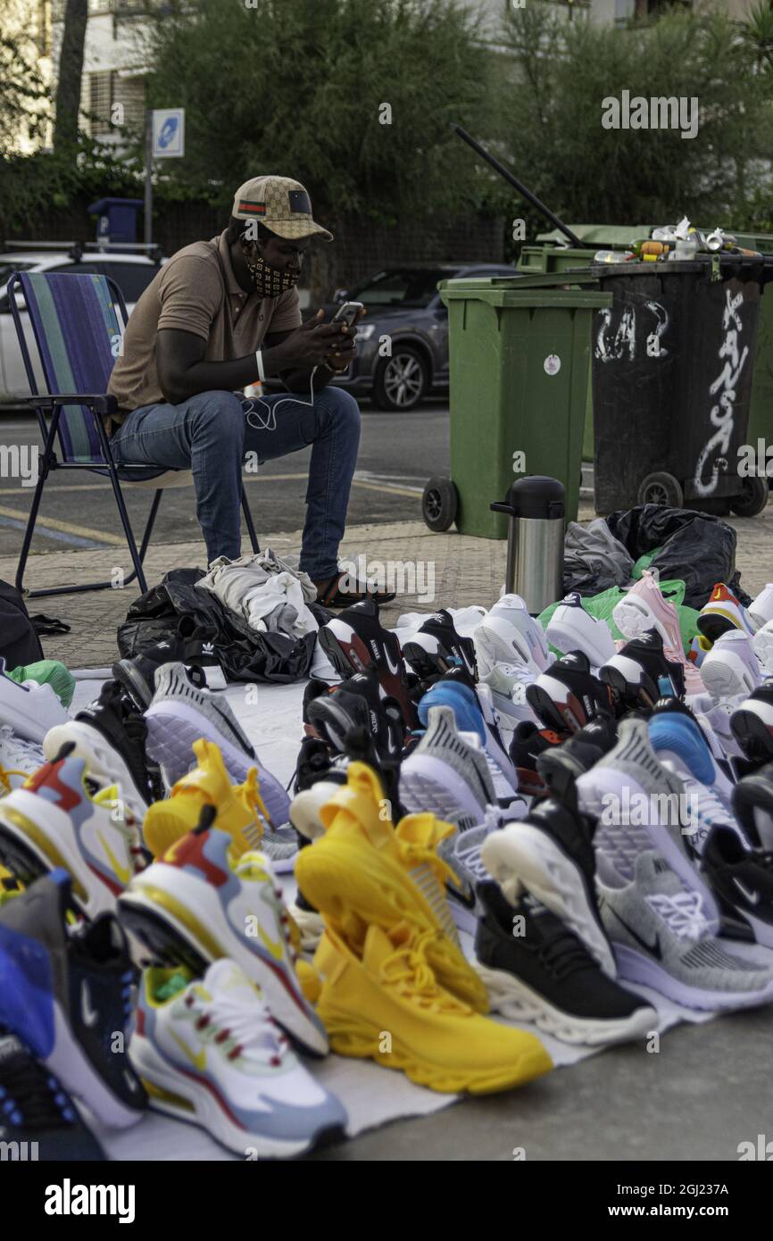 BARCELONA, SPAIN - Oct 26, 2020: The Black man selling clothes on the ...