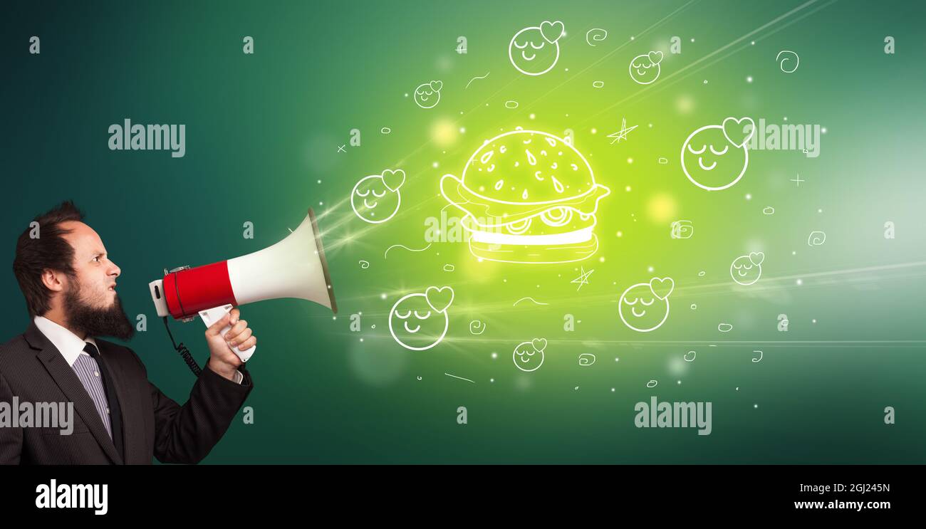 Young person with megaphone and healthy food icon Stock Photo - Alamy