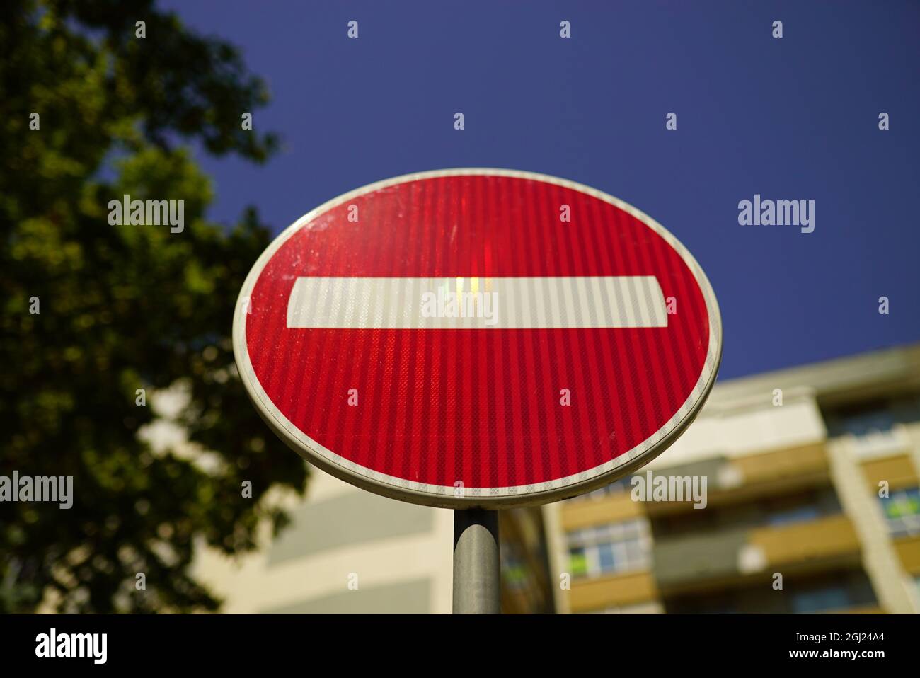 Low angle closeup shot of a red no entry road sign Stock Photo - Alamy