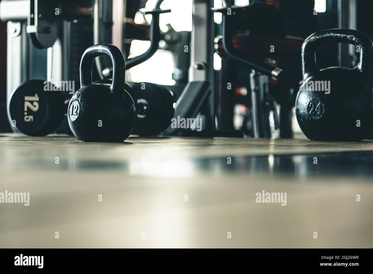 Kettlebells on the background of the interior of the gym without people ...
