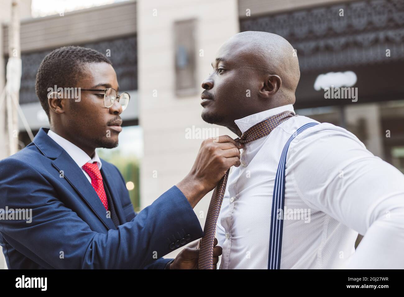 Two black African American businessman friends before an important ...