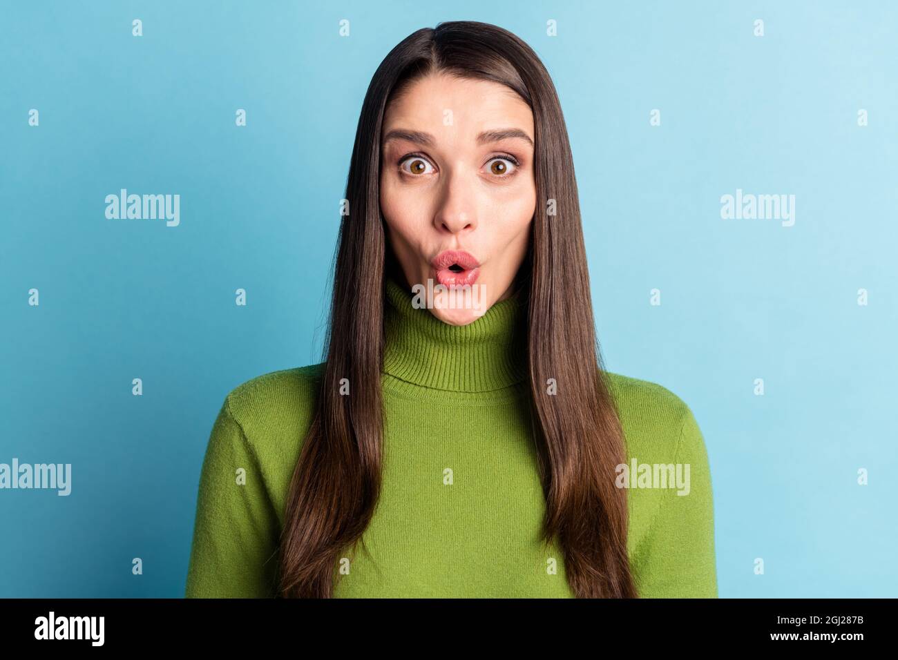 Portrait of attractive amazed cheerful girl staring eyes pout lips ...