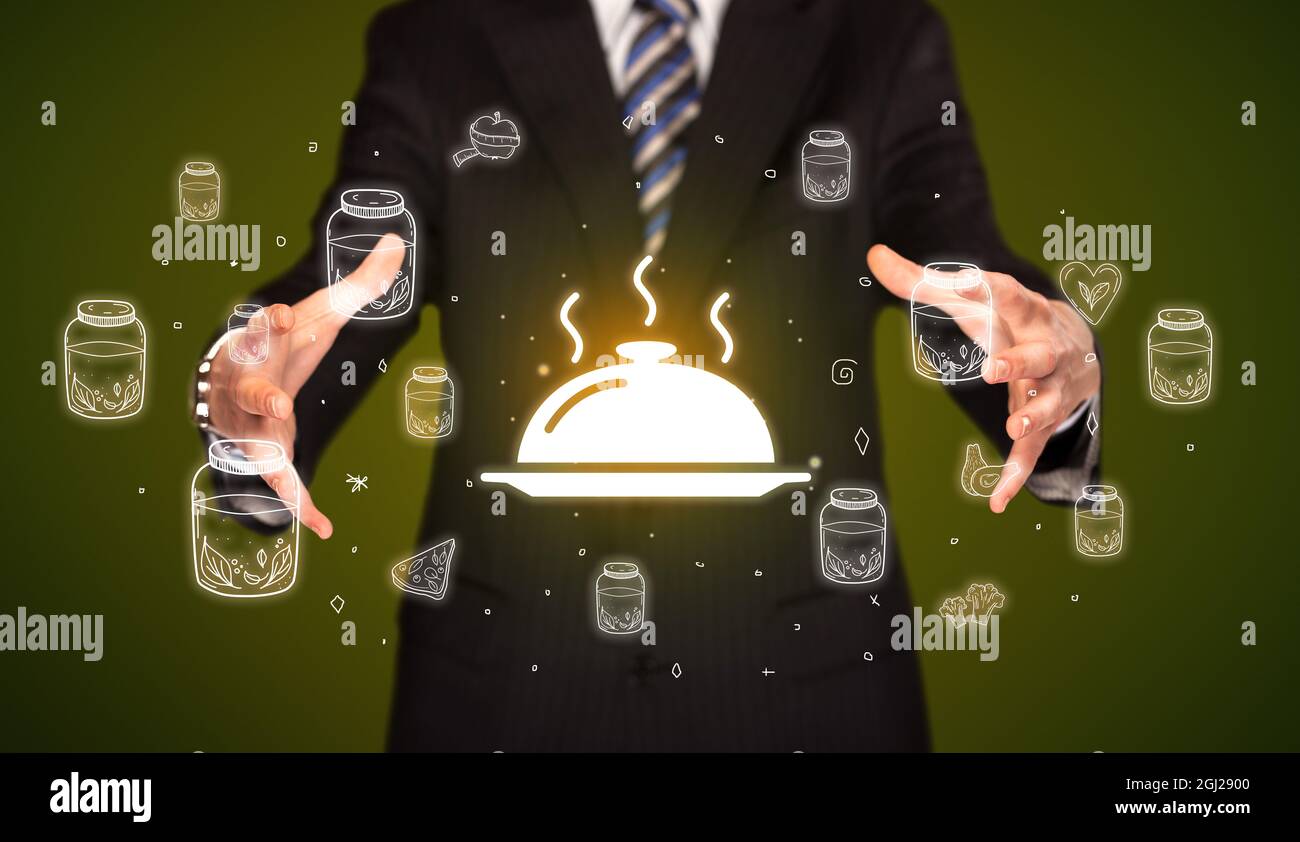 Hand holding food related icons Stock Photo - Alamy