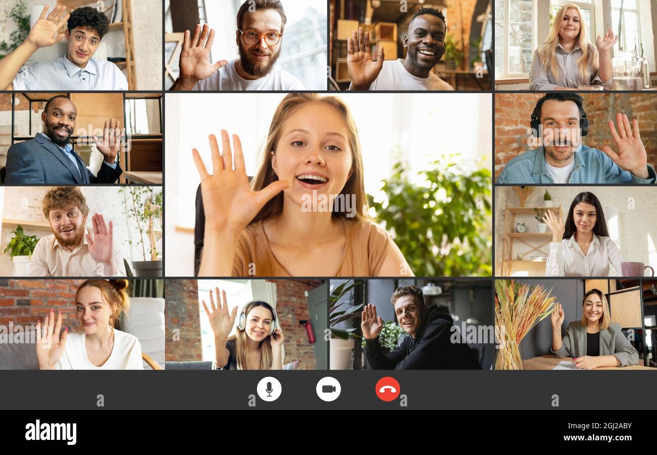Group of multiethnic men and women meeting via group video call share ...