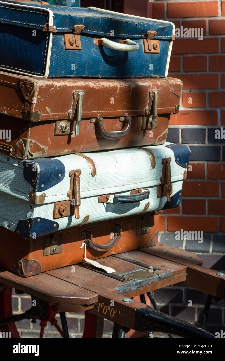 Vintage luggage cases in a stack, UK Stock Photo - Alamy
