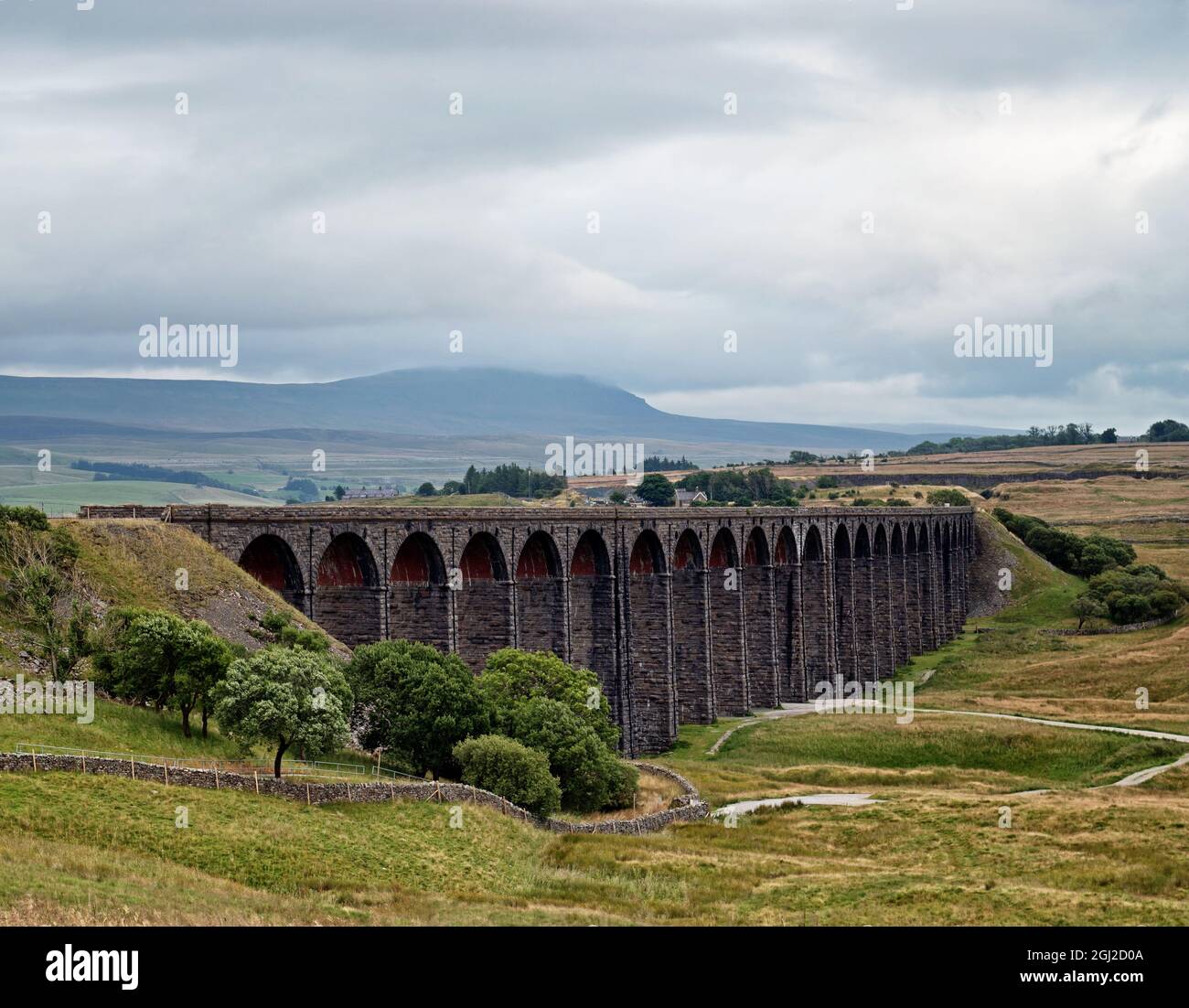 The famous and historic Ribblehead Viaduct, with distant cloud over the ...