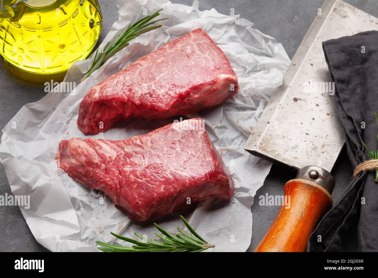 Marbled beef steak. Two fresh raw fillet steaks, herbs and spices Stock ...