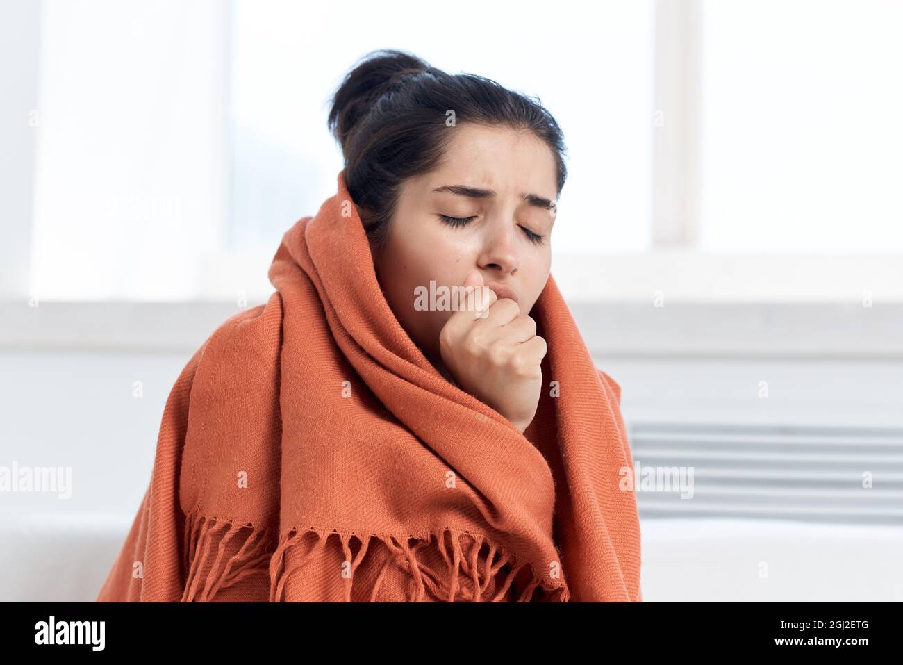sick woman sitting at home cold treatment health problems Stock Photo ...