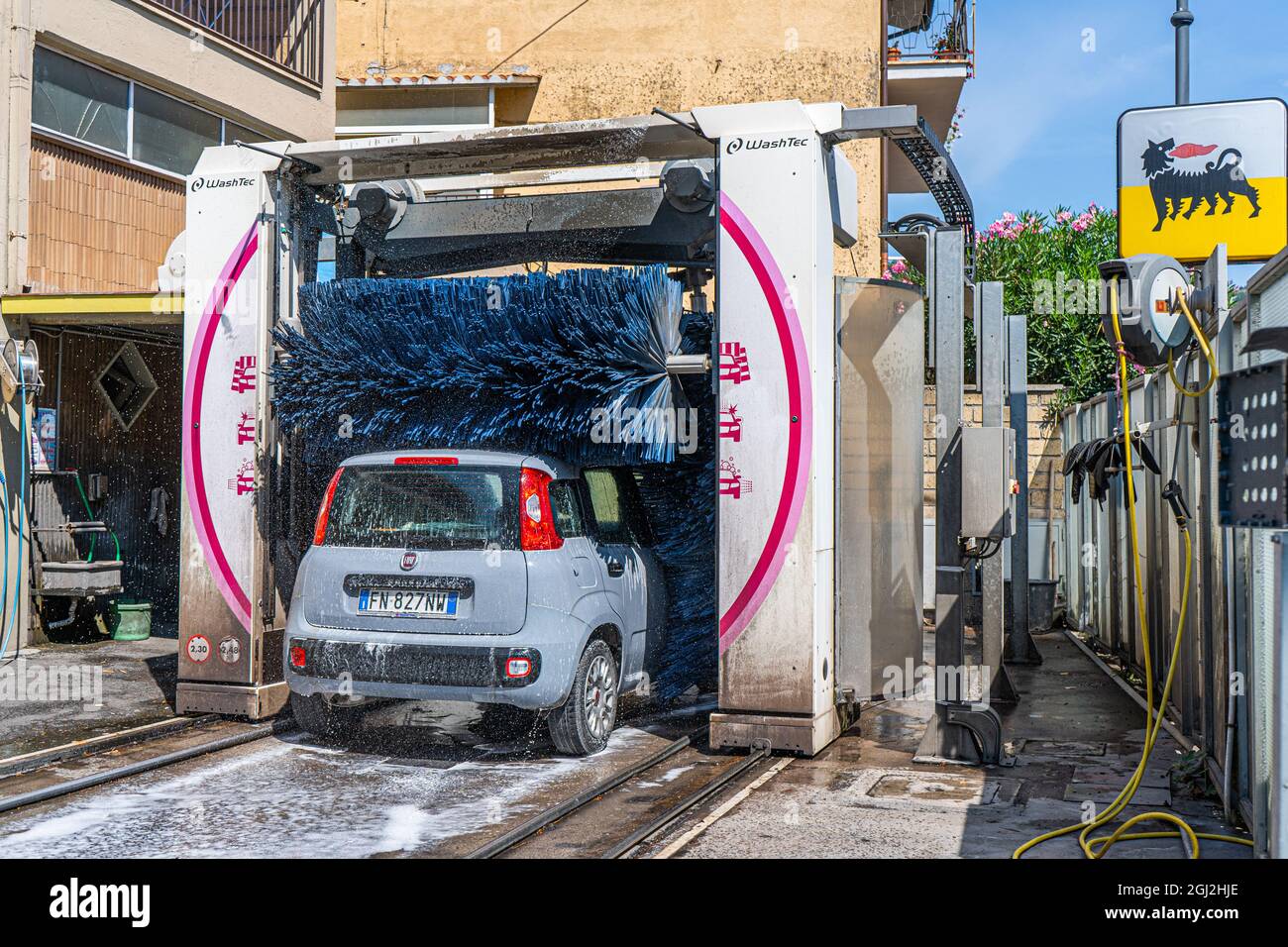 A Fiat in an automatic car wash, Italy Stock Photo - Alamy