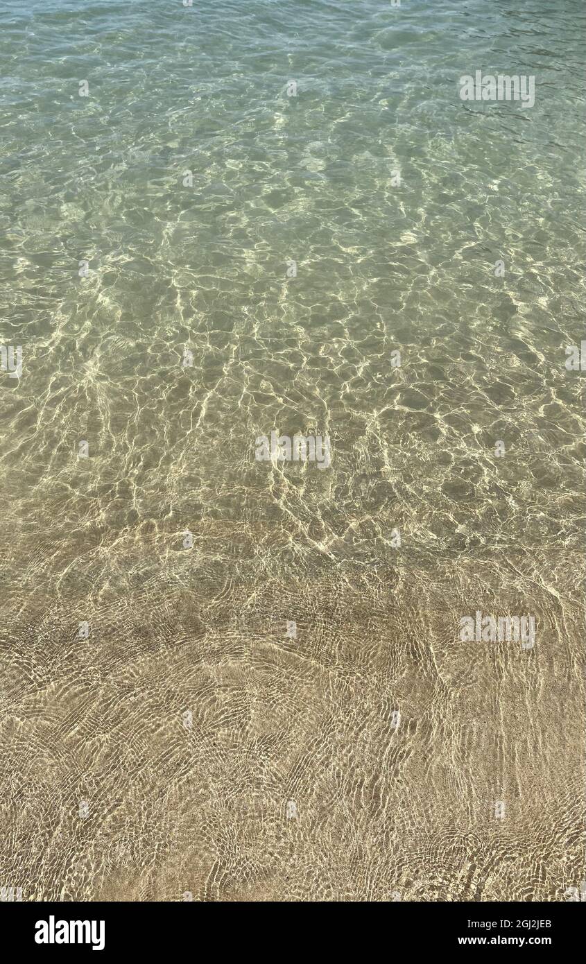 Crystal clear water in Quemado beach in al hoceima Stock Photo - Alamy