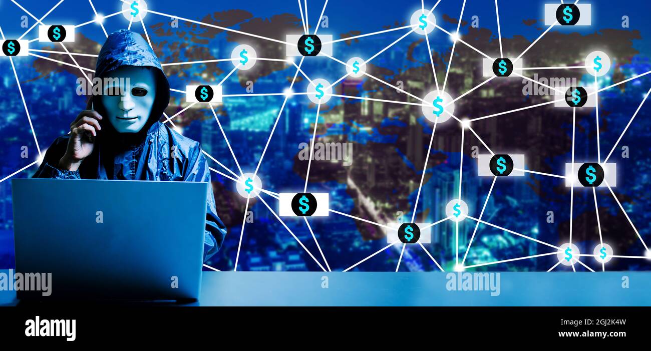 Anonymous computer hacker.He using computer for cyber attack and ...