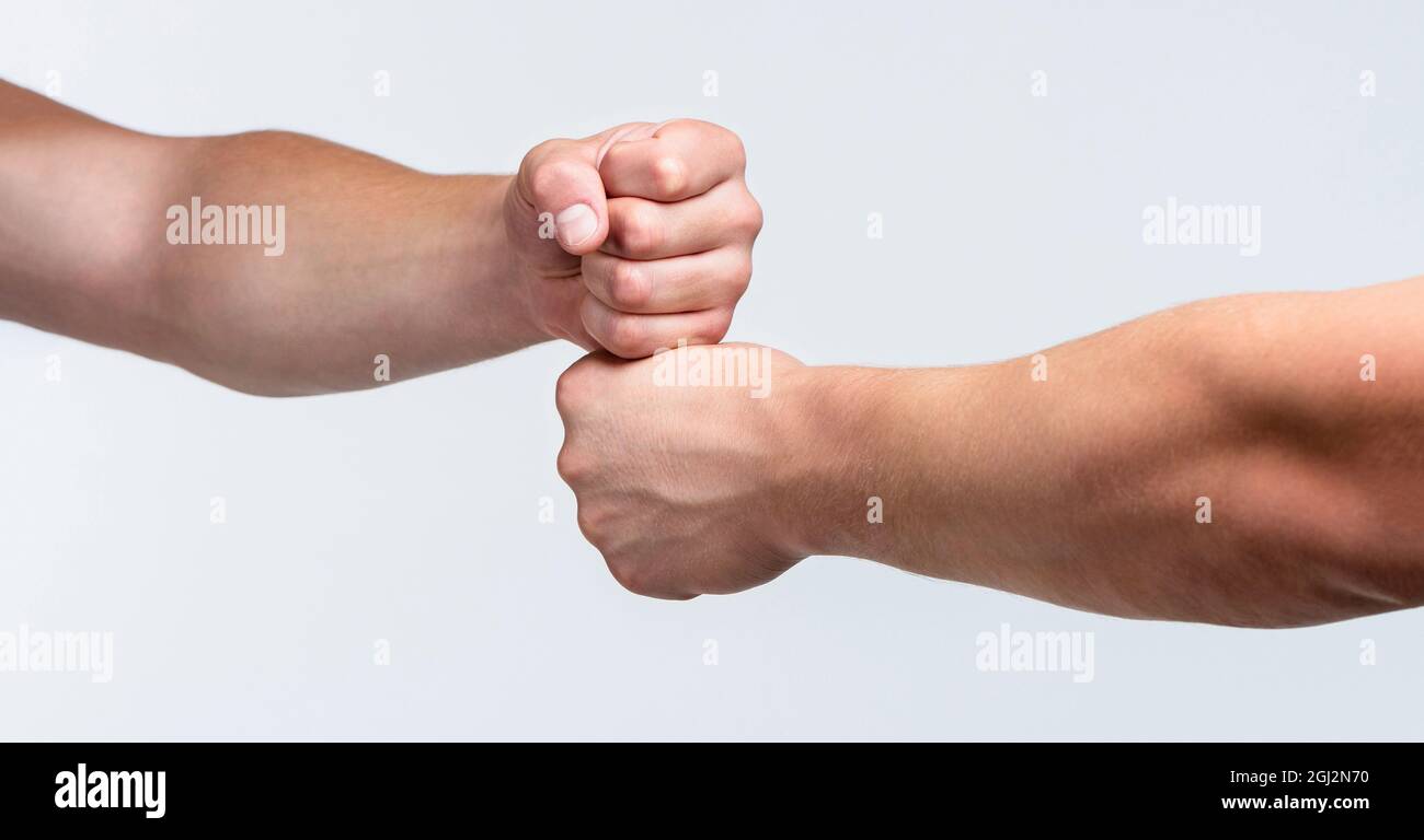 Team concept. People bumping their fists together, arms. Friendly ...