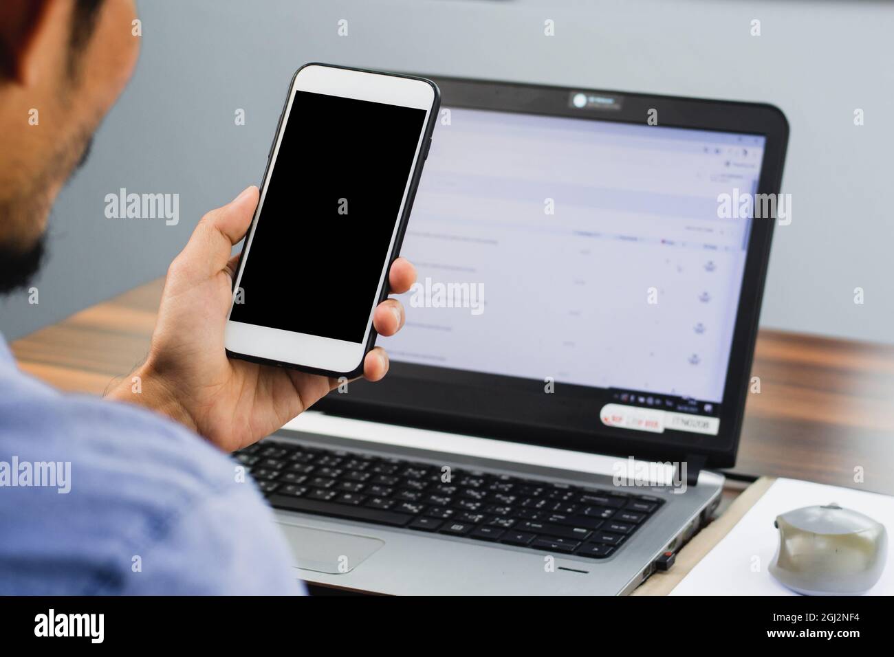 Man using mobile smartphone computer Stock Photo - Alamy