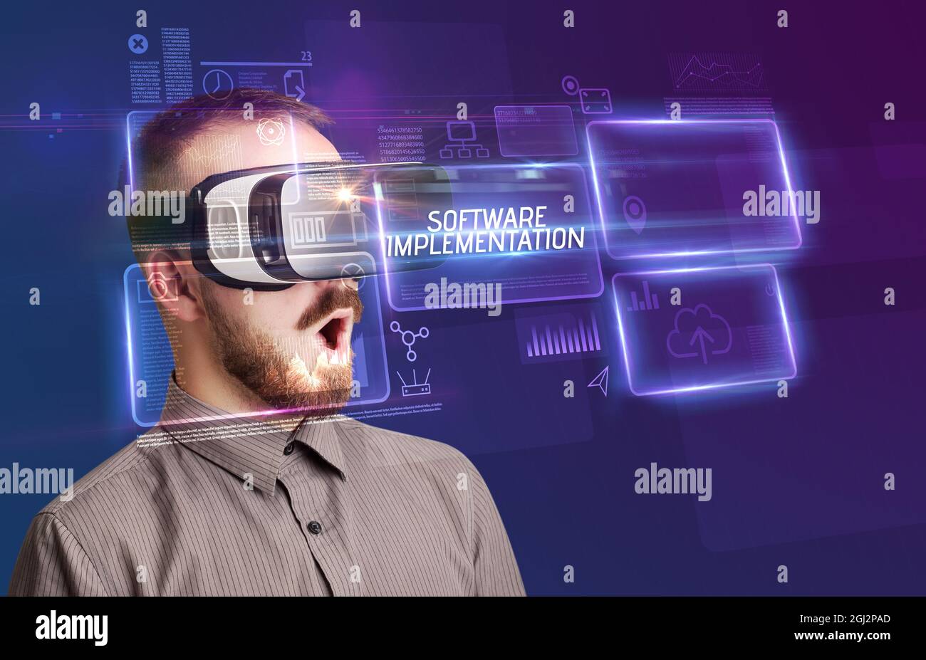 Businessman looking through Virtual Reality glasses, tech concept Stock ...