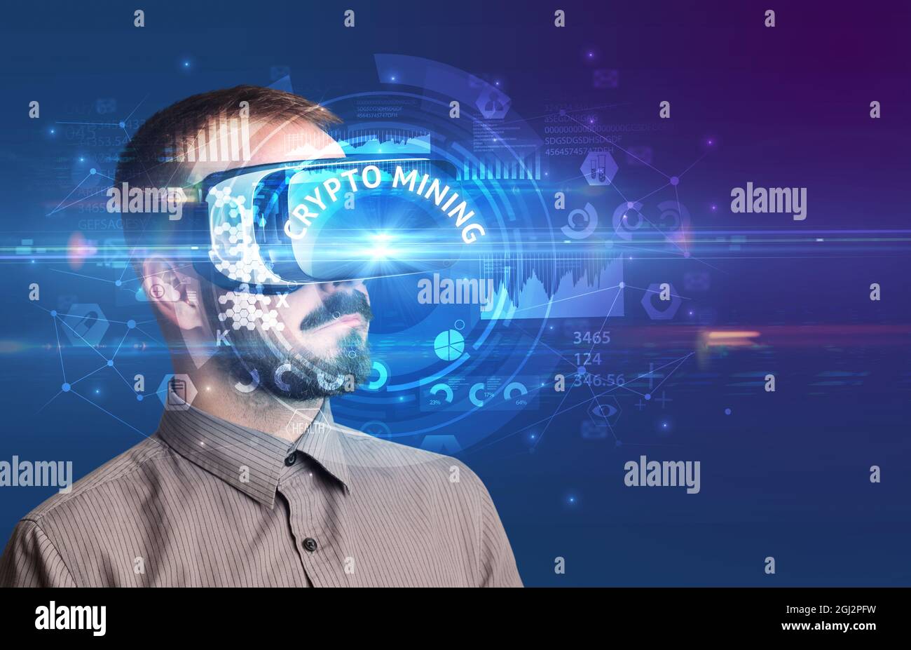 Businessman looking through VR glasses Stock Photo - Alamy