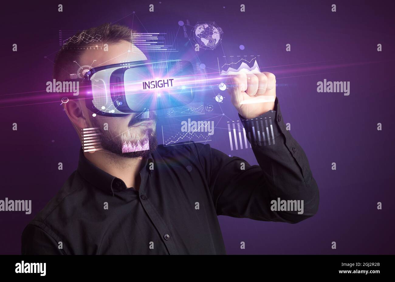 Businessman looking through Virtual Reality glasses Stock Photo - Alamy