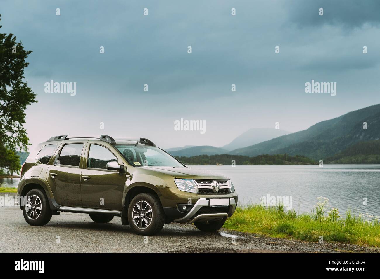 Kroderen, Norway. Car Renault Duster SUV Parked Near Lake Kroderen In ...