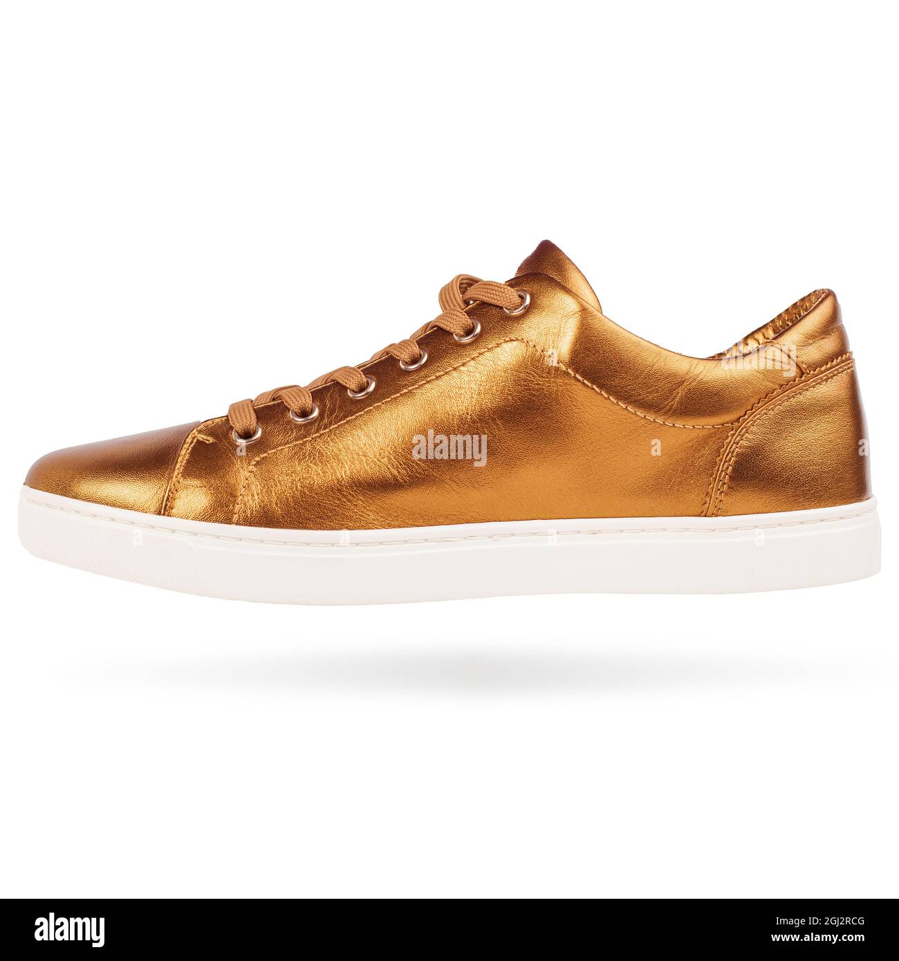 Gold shoe detail Cut Out Stock Images & Pictures - Alamy