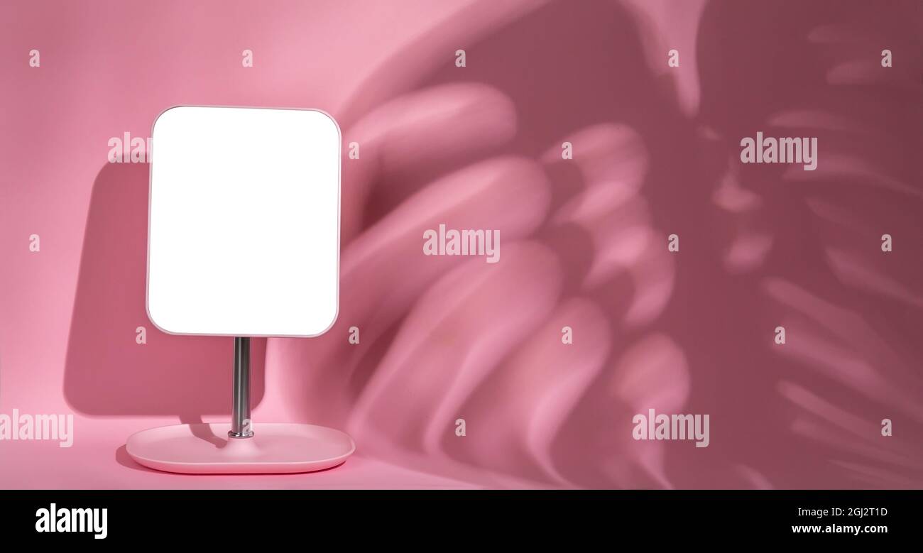 mirror on a pink background with copy space Stock Photo - Alamy