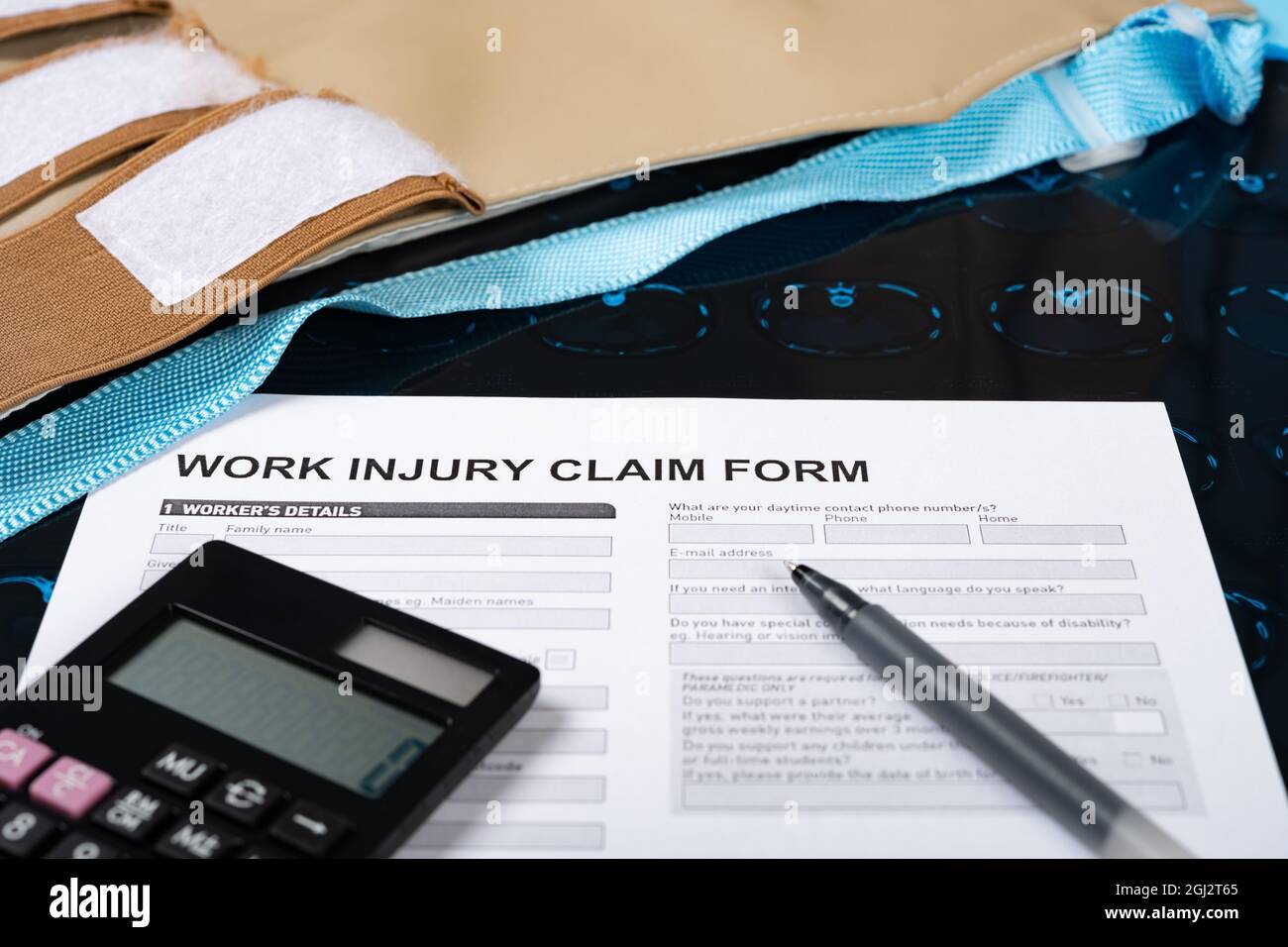 work injury claim form with CT film medical and insurance concept Stock ...