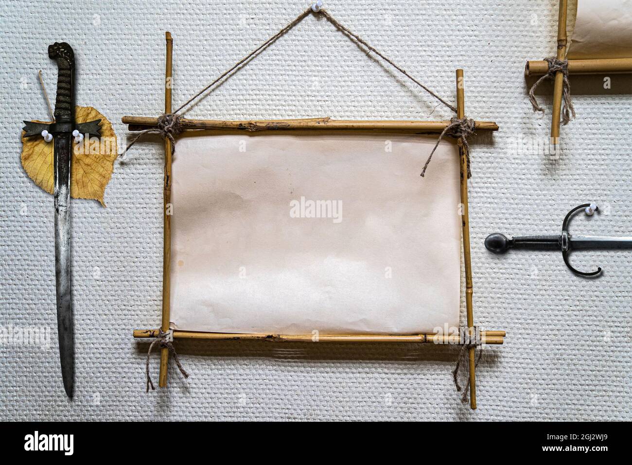 Bamboo sticks frame sign with vintage old paper Stock Photo - Alamy