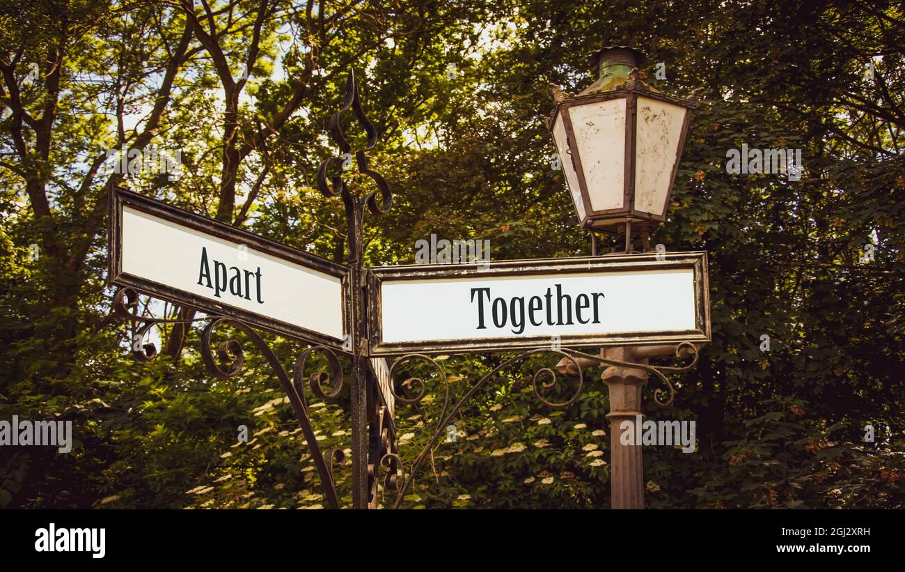 Street Sign the Direction Way to Together versus Apart Stock Photo - Alamy