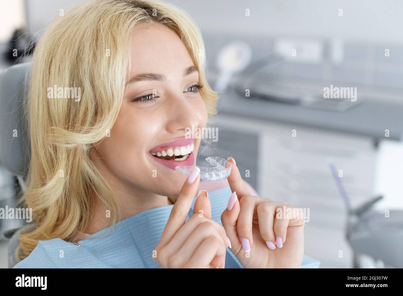 Invisalign orthodontics, modern dentistry concept. Happy young ...