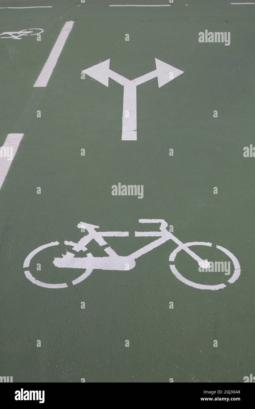 Bike Path Symbol Sign with Arrow Stock Photo - Alamy