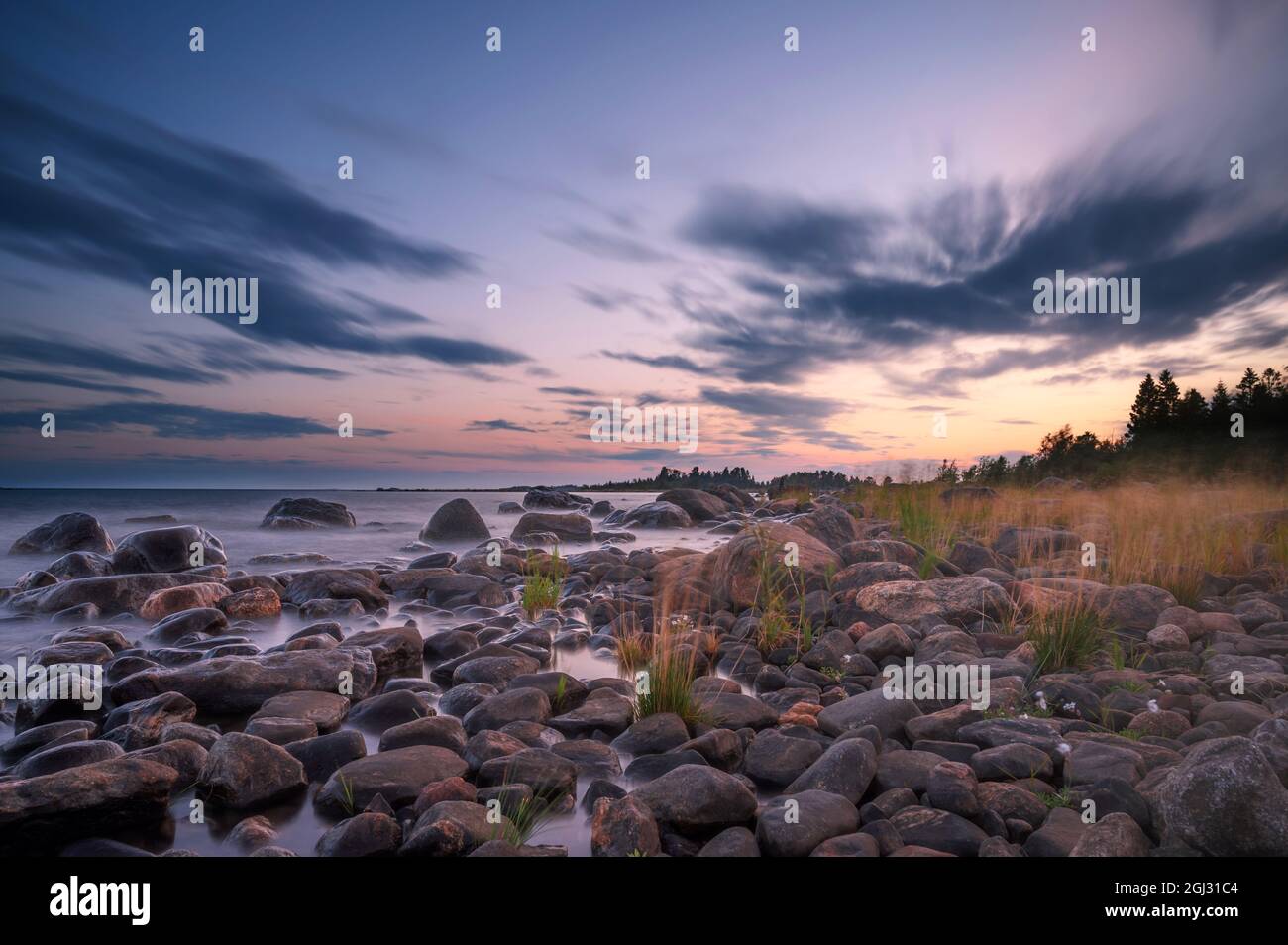 Long Exposure of Magnificent Soft and colorful sunset by the seaside ...