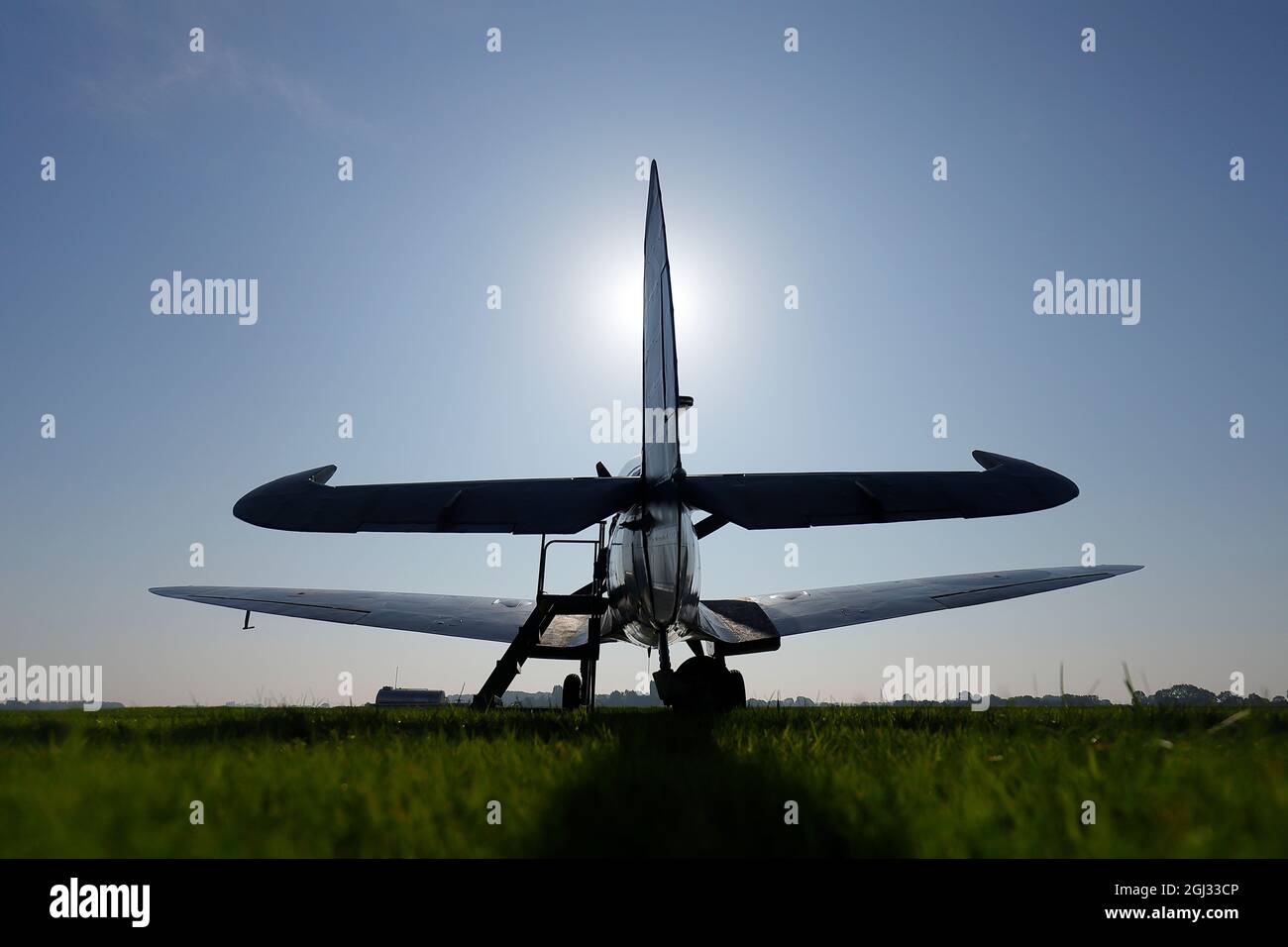 A silhouette of the rear view of a Spitfire aircraft Stock Photo - Alamy